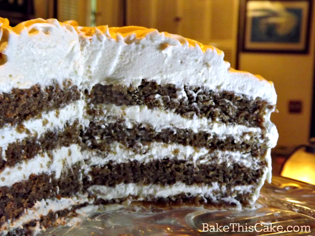 Cutaway of brown red velvet cake with blue watercolor in BG by ...